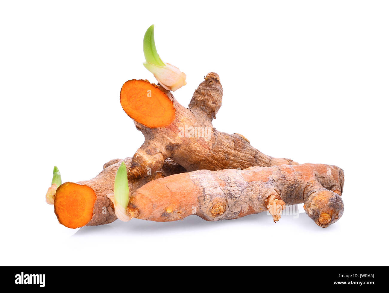tropical herbs, turmeric root with sapling isolated on white background ...