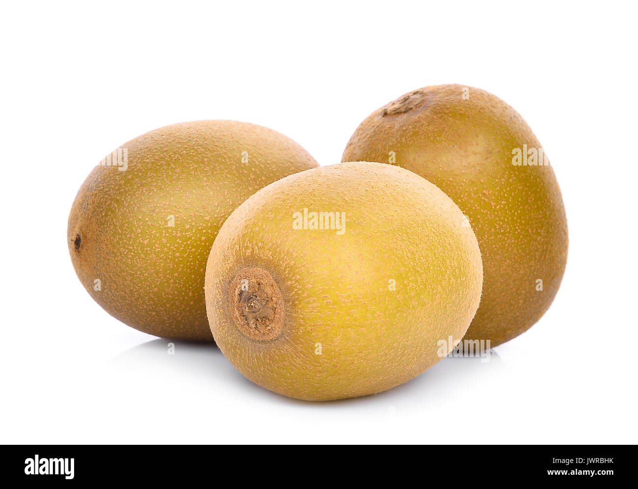 three whole yellow or gold kiwi fruit isolated on white background ...