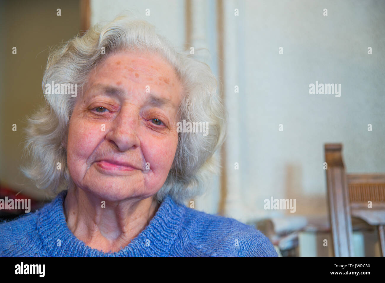 Old lady at home. Close view Stock Photo - Alamy