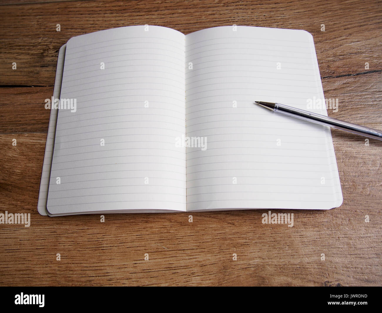 Open notebook with pen hi-res stock photography and images - Alamy