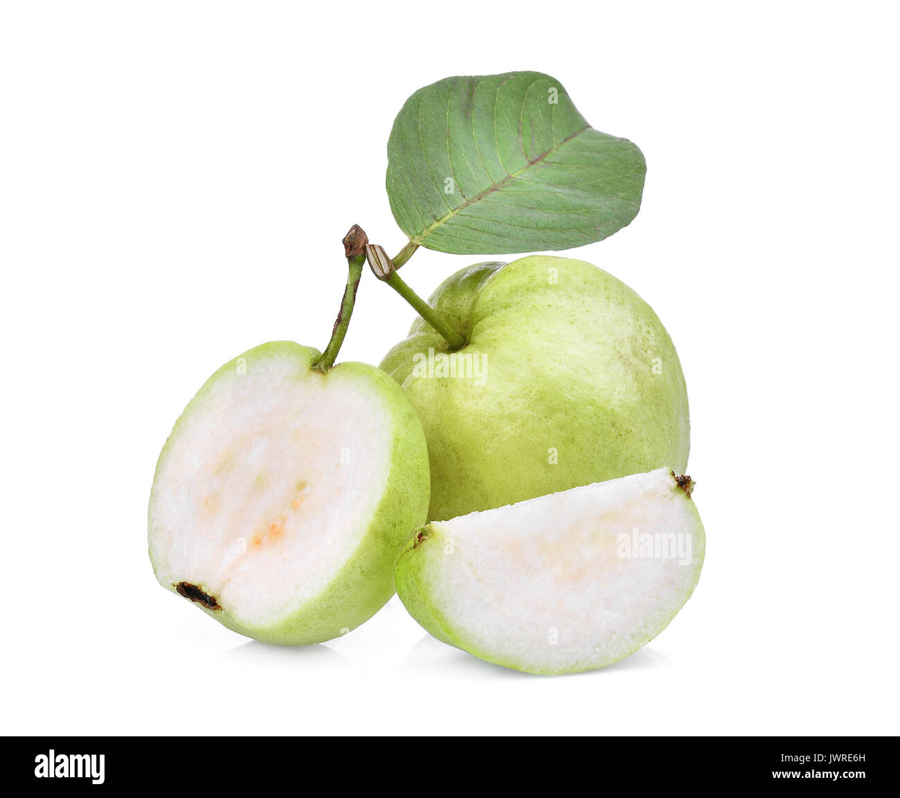 whole and half guava fruit with green leaf isolated on white background ...