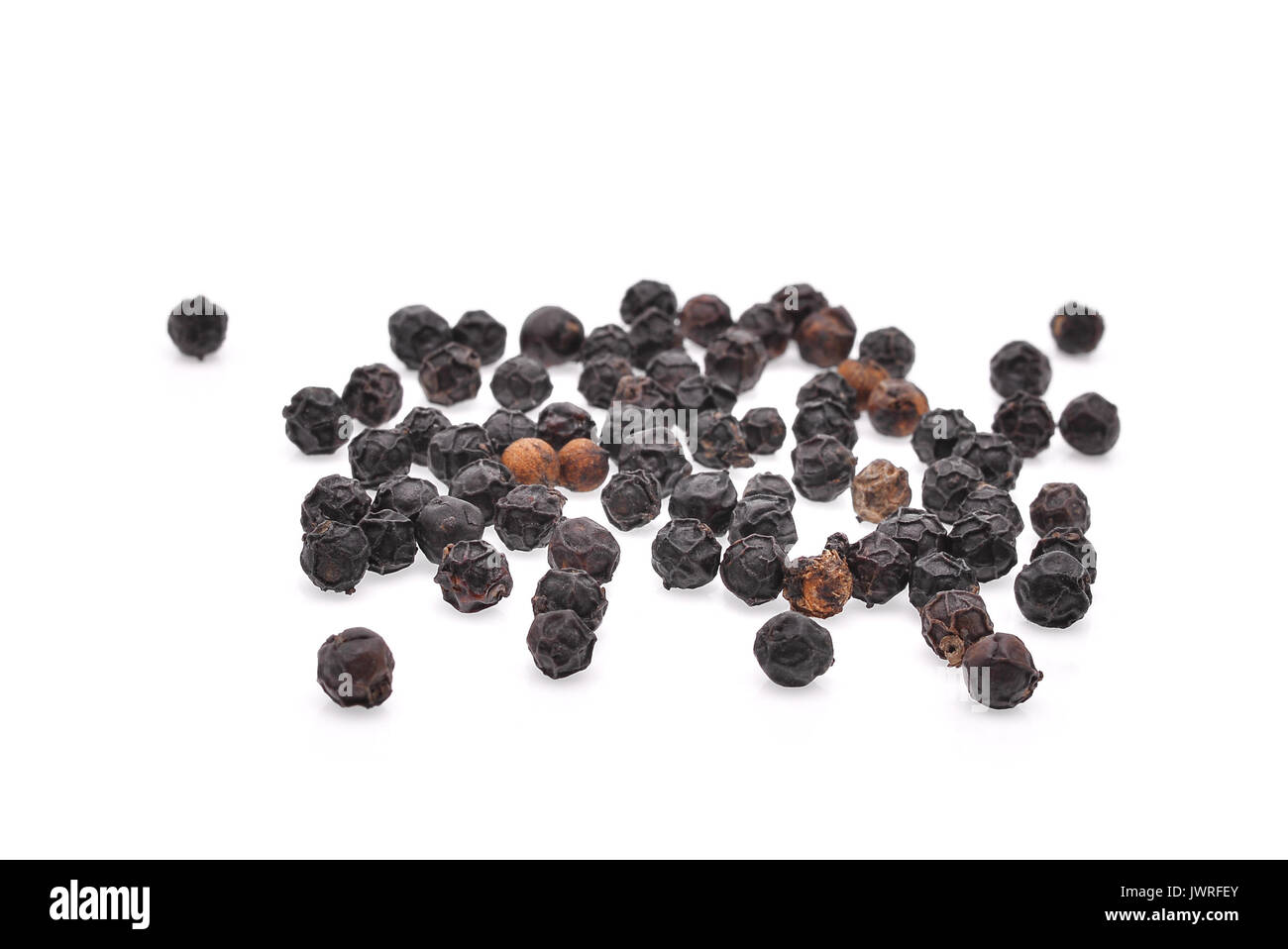 black pepper seed isolated on white background Stock Photo - Alamy