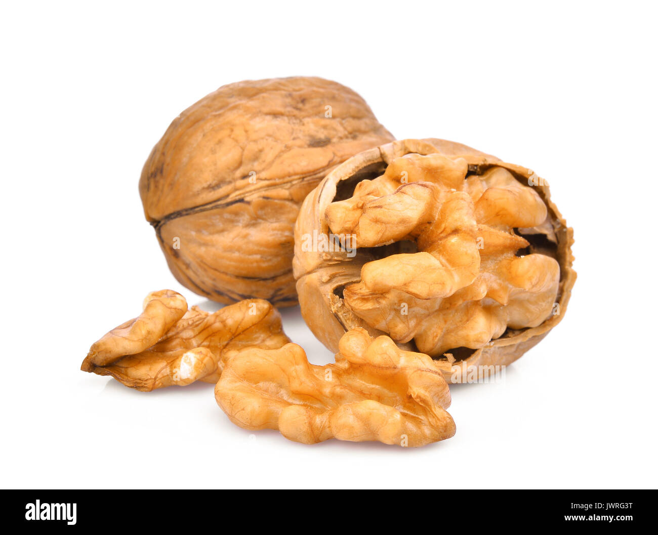 Whole walnuts on wooden Cut Out Stock Images & Pictures - Alamy