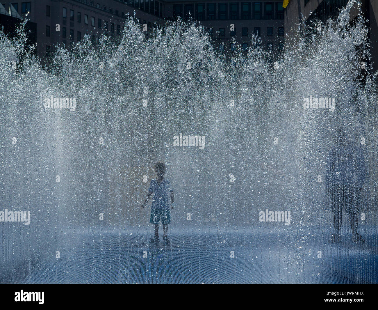 Kids getting soaking wet hi-res stock photography and images - Alamy