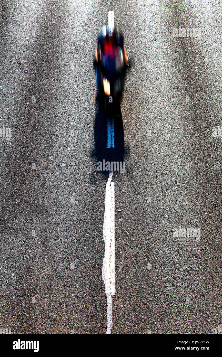 Bird view of a motorcycle on the asphalt road Stock Photo - Alamy