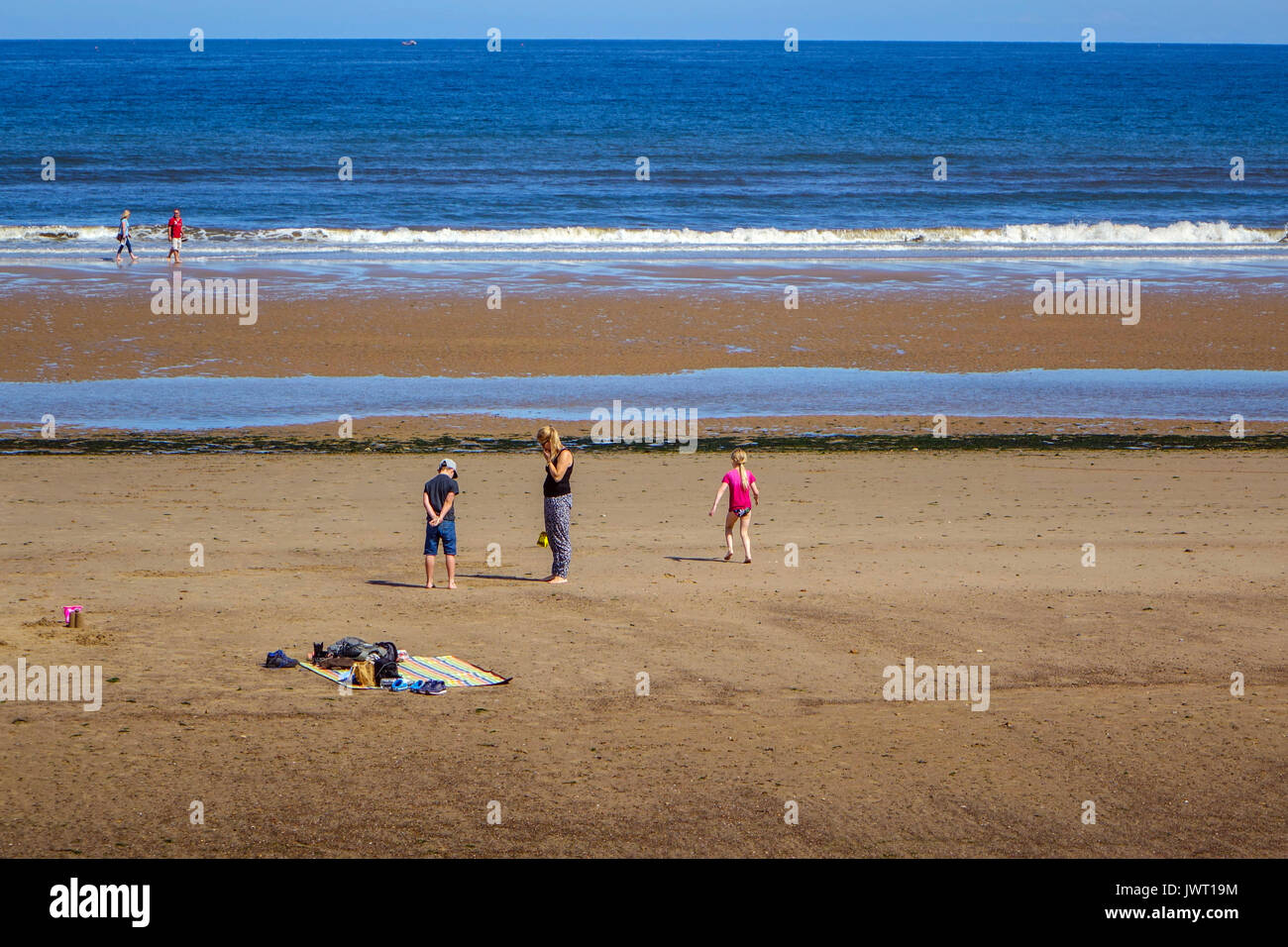 People on the beach, summer, Saltburn by the Sea, North Yorkshire ...