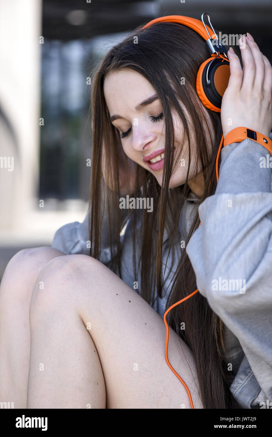 Young, attractive woman with headset (model-released Stock Photo - Alamy