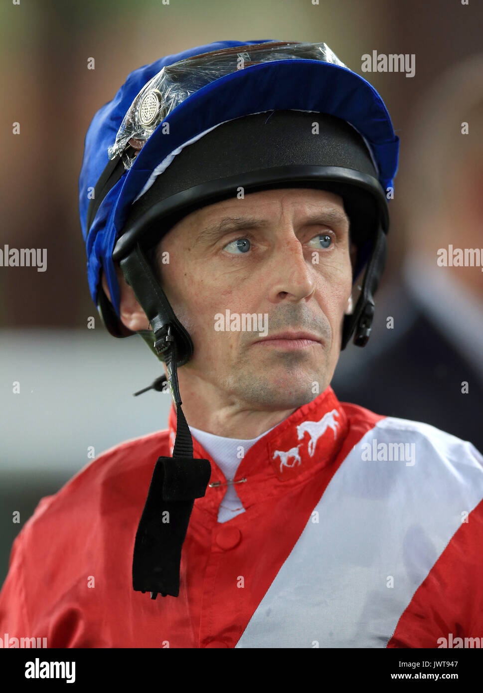Ted Durcan makes his way into the parade ring prior to the Betfred Rose ...