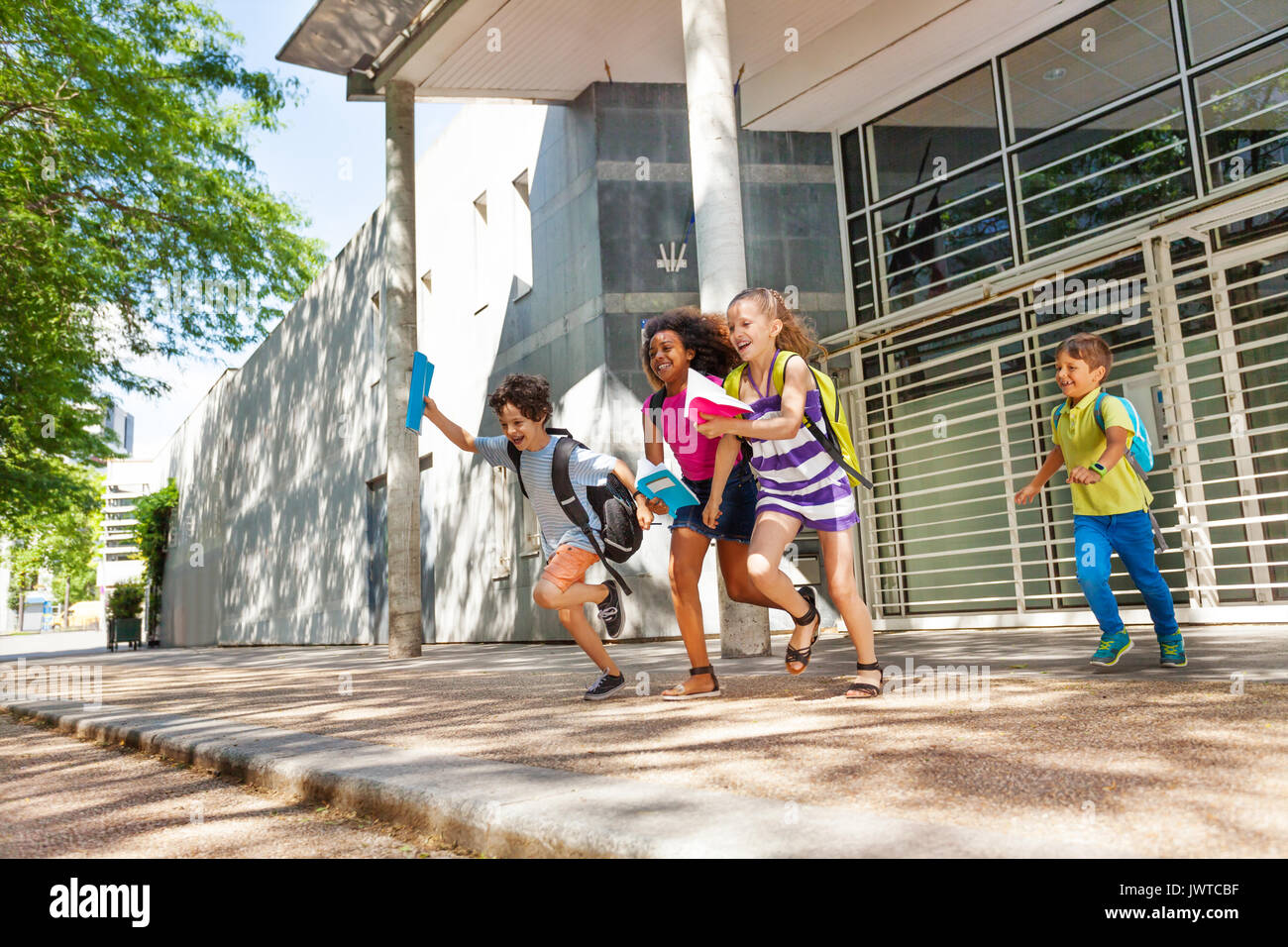 Kids running from school hi-res stock photography and images - Alamy