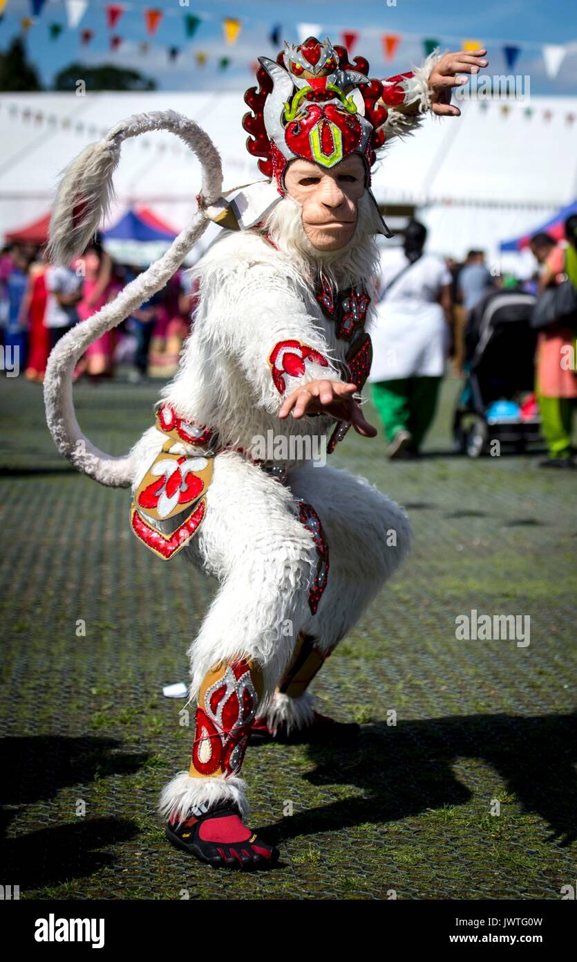 A man dressed as Hindu monkey god Hanuman during the Janmashtami Hindu ...