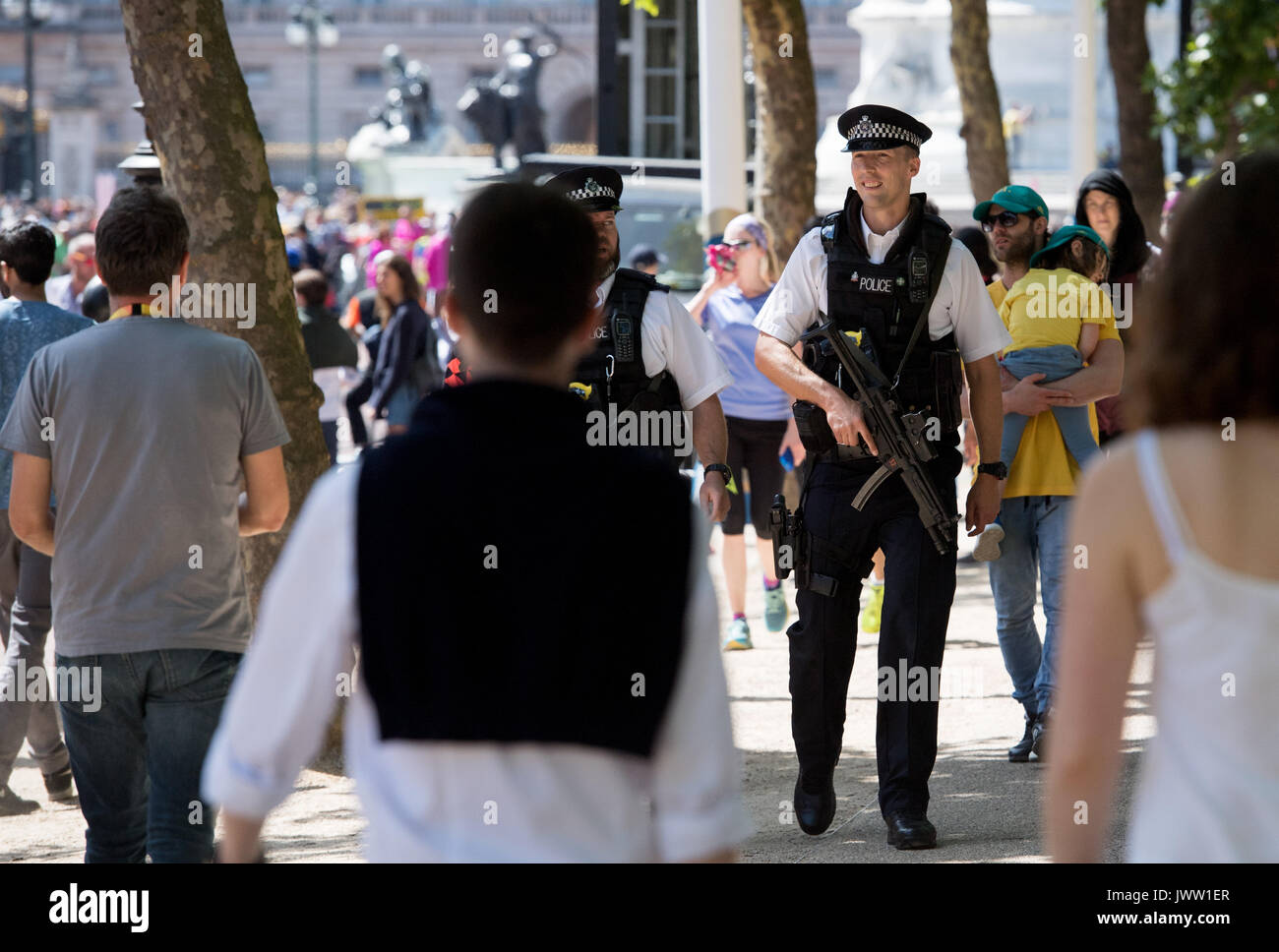 London, UK. 13th Aug, 2017. Two British police officers carrying ...