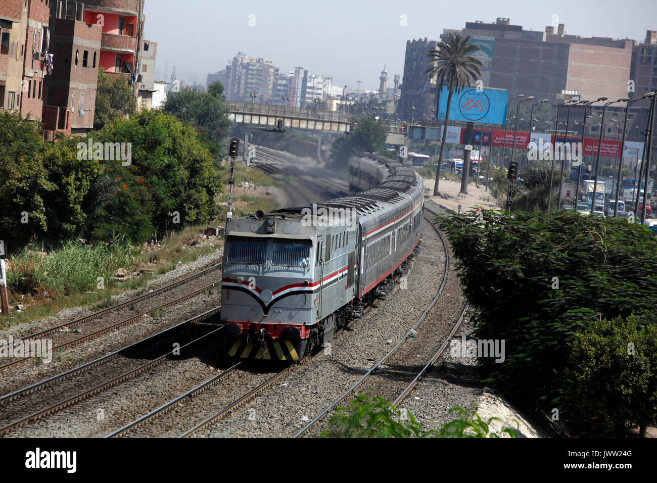 Cairo, Egypt. 13th Aug, 2017. A train runs along old railway network in ...