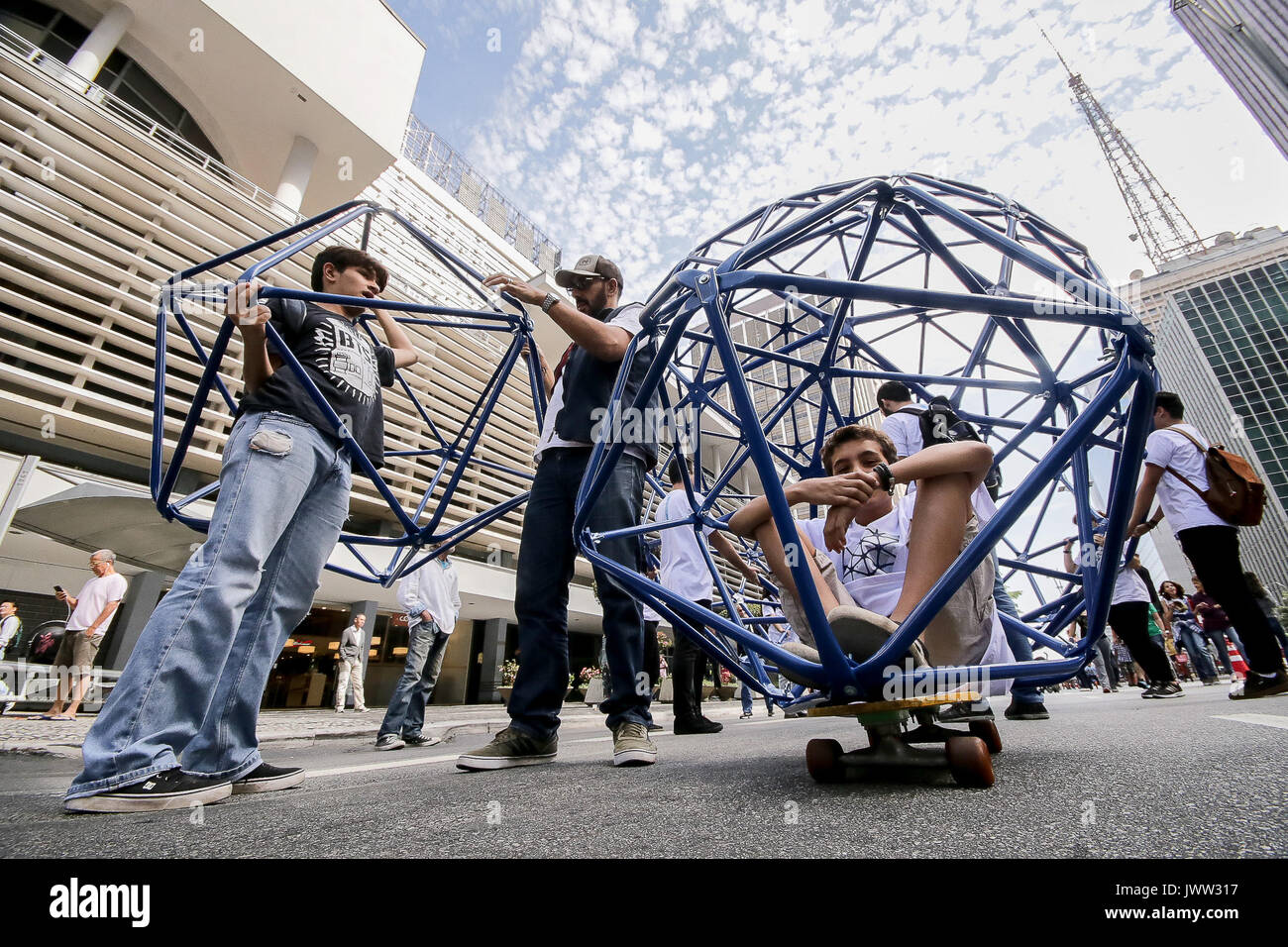 Sao Paulo, Brazil. 13th Aug, 2017. People interact with geometric ...