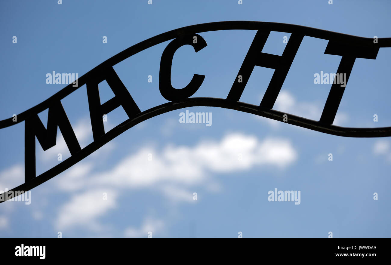 A view of the gate with the writing "Work brings freedom" on it in the ...