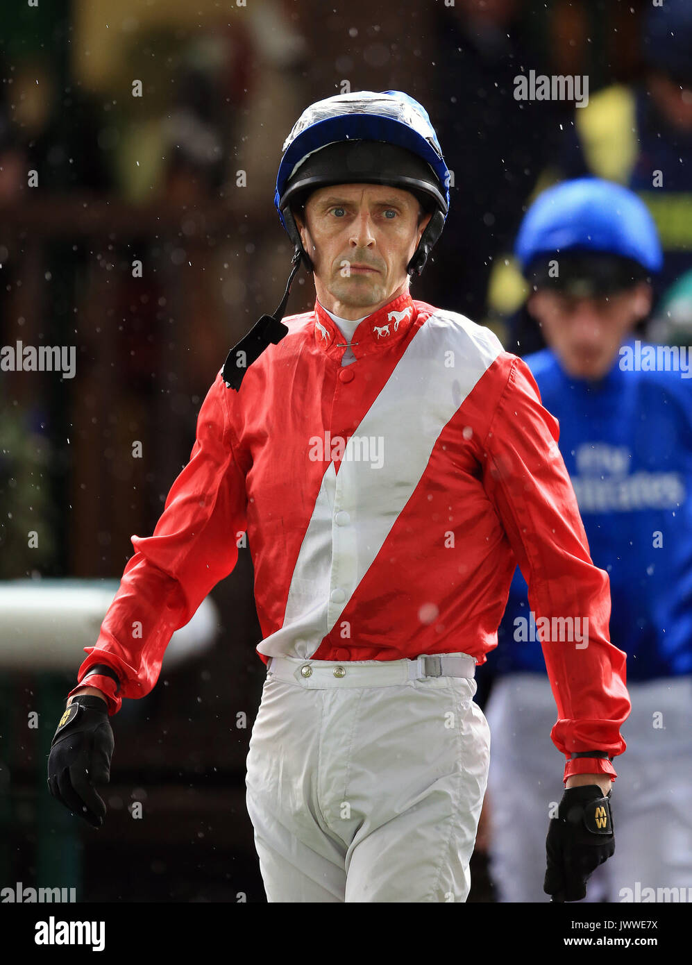Ted Durcan makes his way into the parade ring prior to the Betfred Rose ...