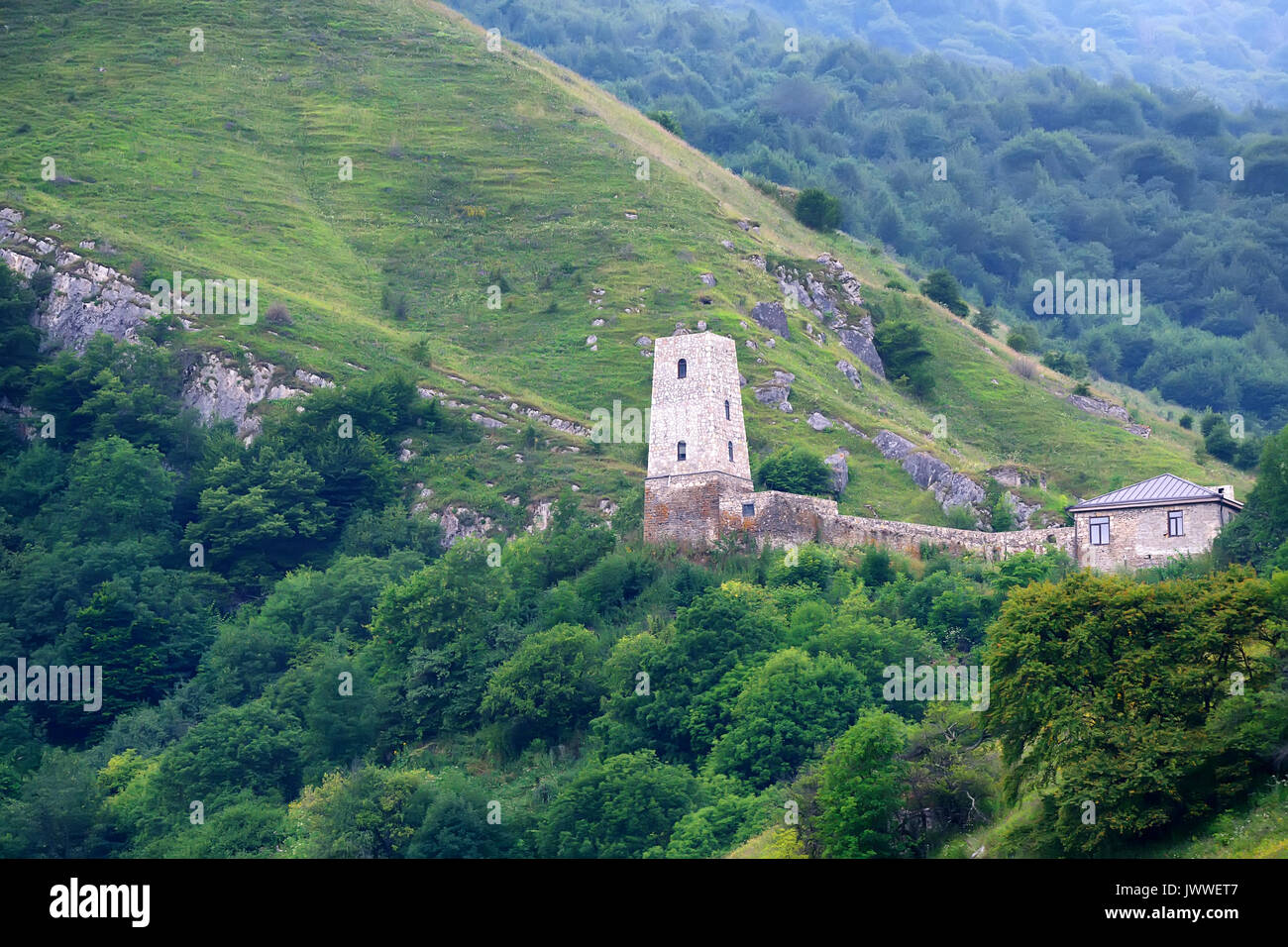 Beautiful stone homestead in mountains in Ossetia Stock Photo - Alamy
