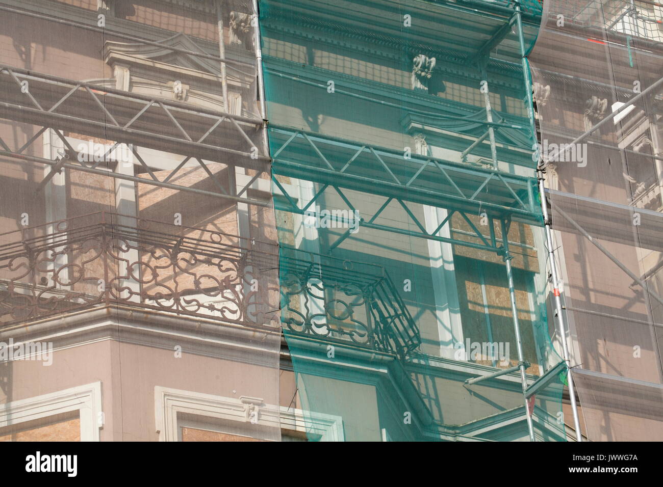 scaffold and Cover tarpaulin and Window on a Construction Site Stock ...