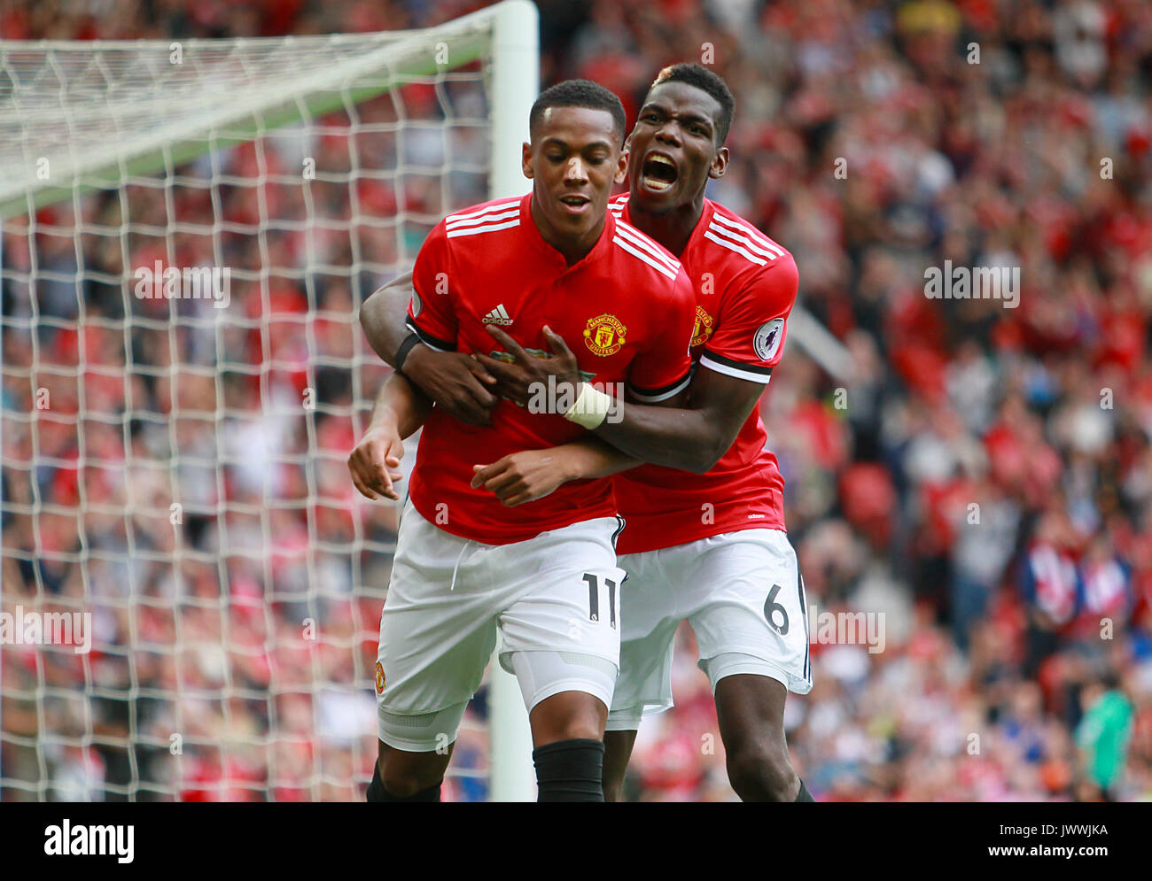 Manchester United's Anthony Martial celebrates scoring his side's third ...