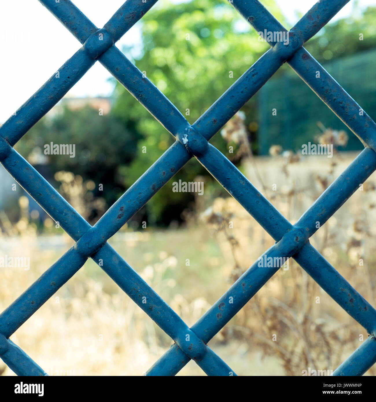 Old rusty iron bars that are part of a deserted, broken house Stock ...