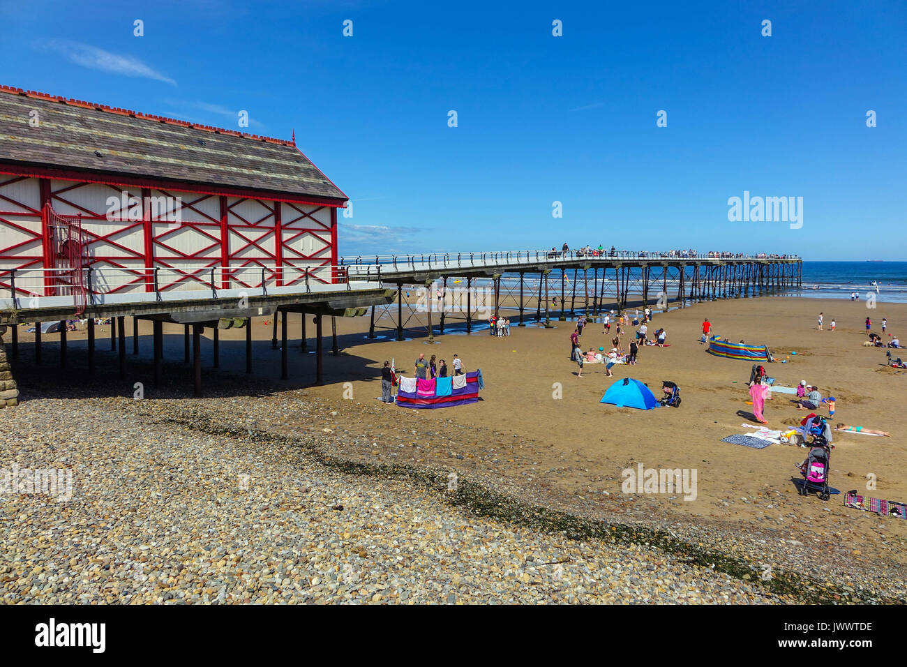 Summer holiday crowds on the beach, Saltburn by the Sea, North ...