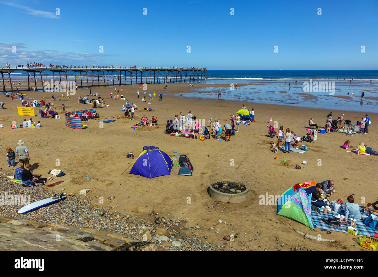 Summer holiday crowds on the beach, Saltburn by the Sea, North ...