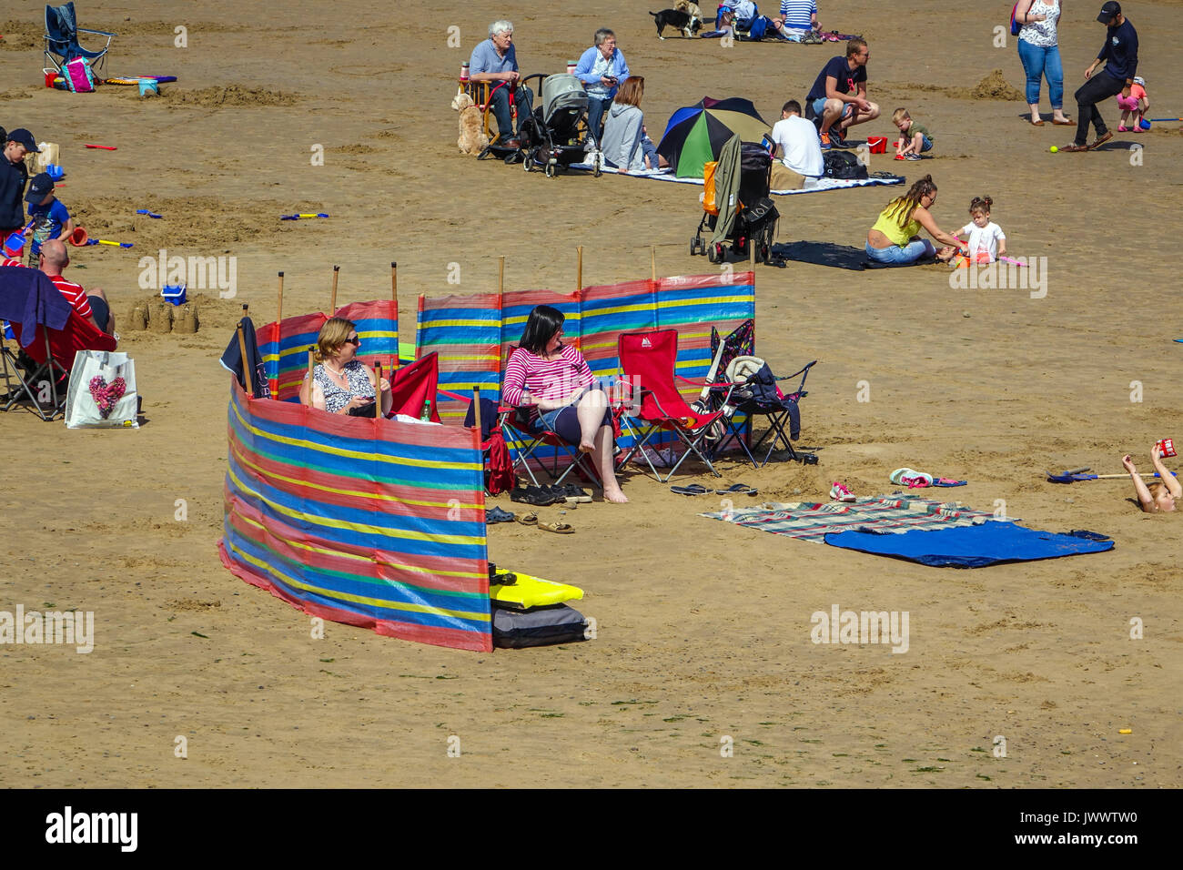 Summer holiday crowds on the beach, Saltburn by the Sea, North ...