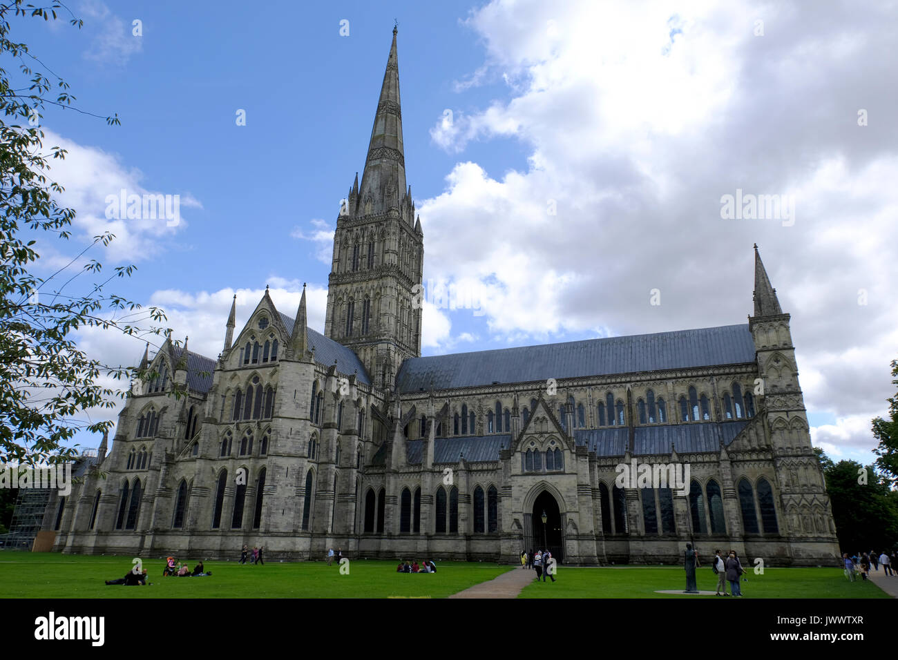 Summer tourists visiting Salisbury Cathedral, Wiltshire,UK Stock Photo ...