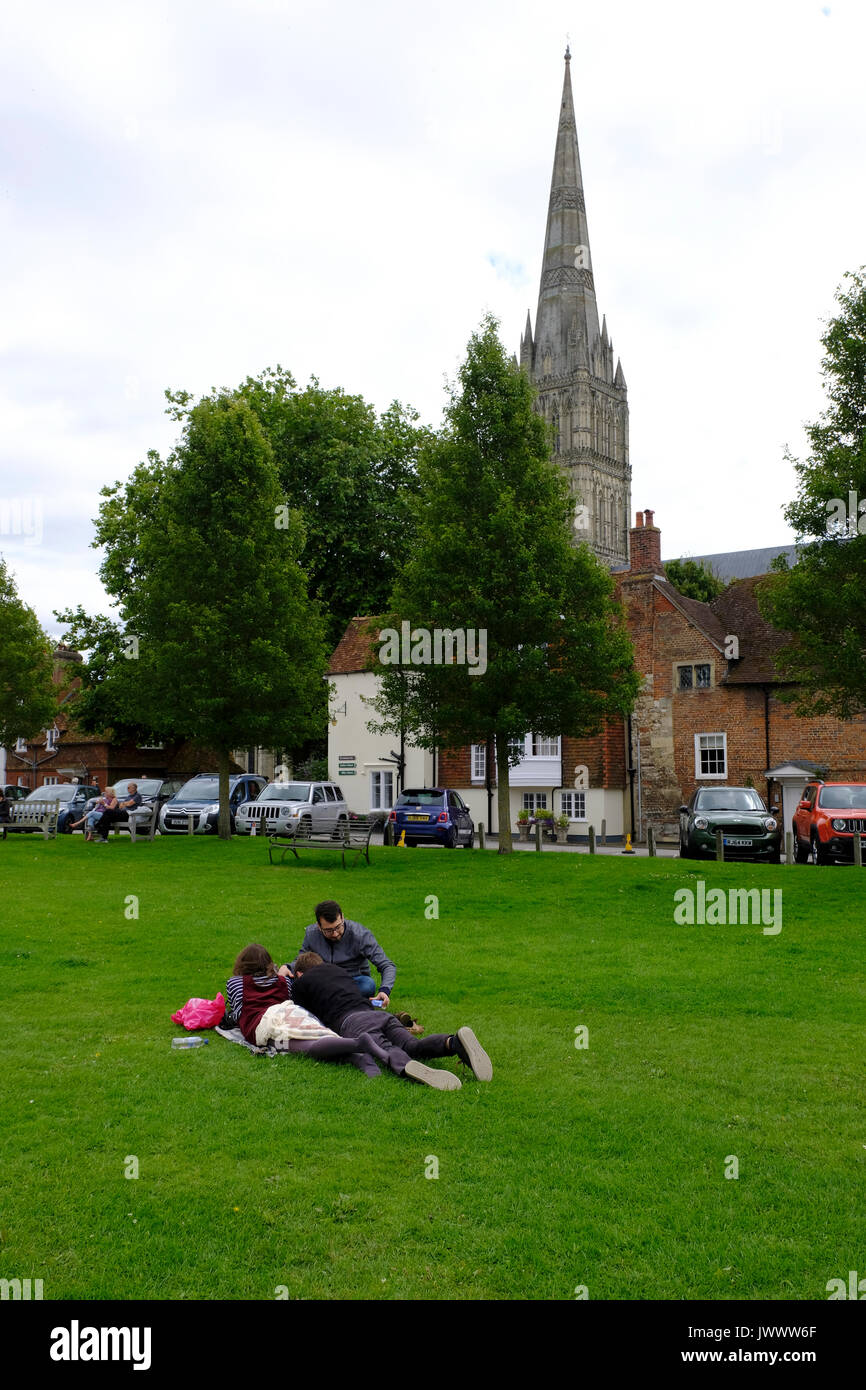 Summer tourists visiting Salisbury Cathedral, Wiltshire,UK Stock Photo ...