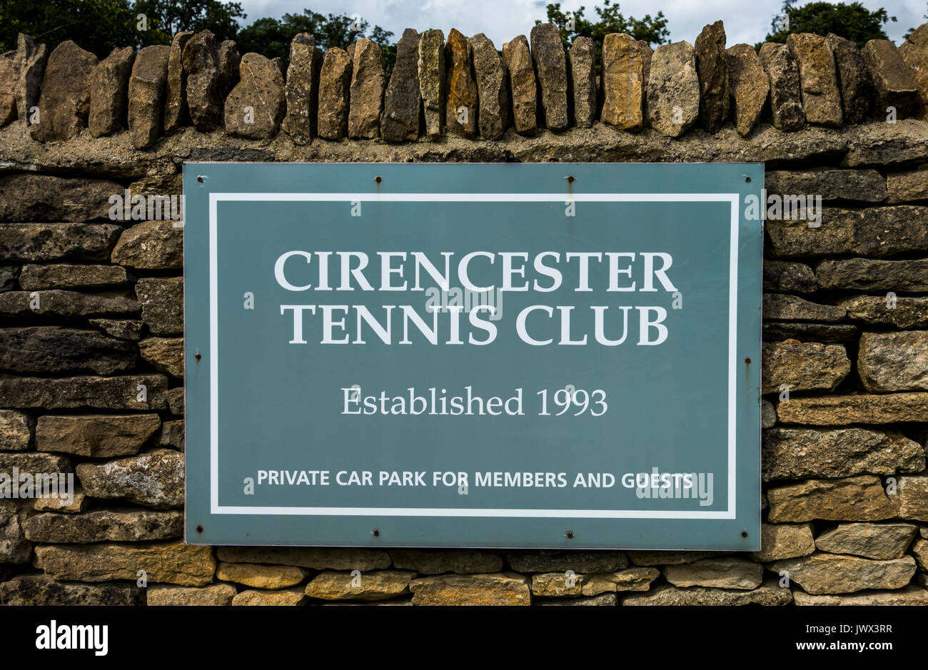 Cirencester Tennis Club sign attached to a stone wall on the Bathurst ...