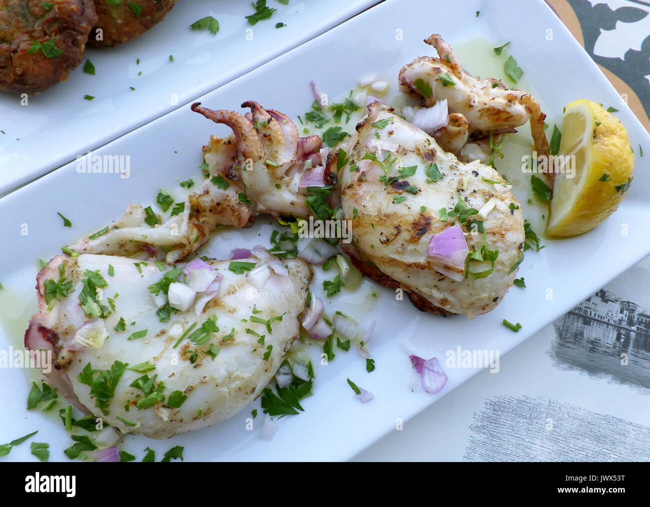 Grilled fresh squid with olive oil and lemon, Testy Mediterranean Dish ...