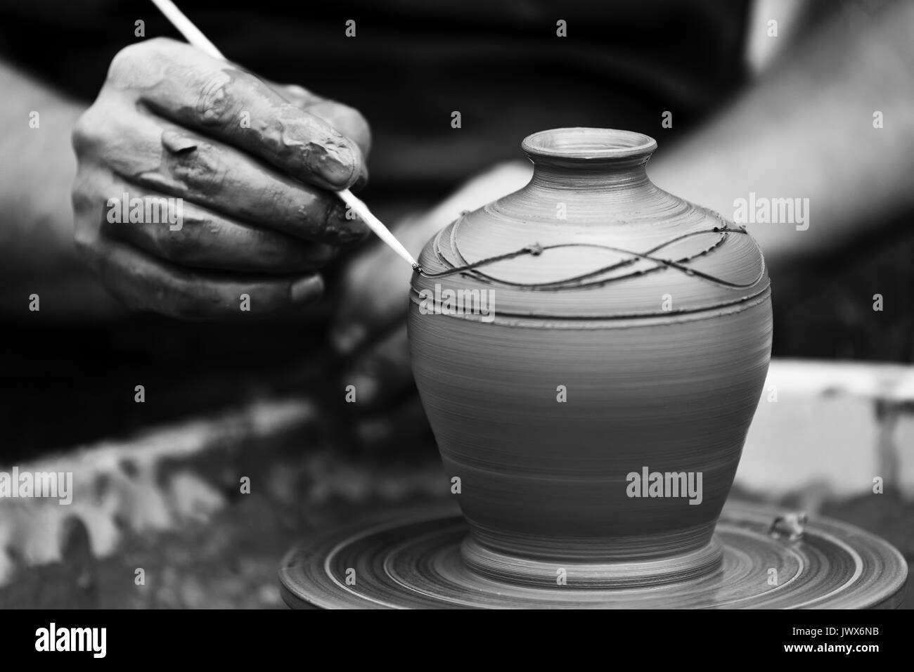 Hands of a potter. Potter making ceramic pot on the pottery wheel Stock ...