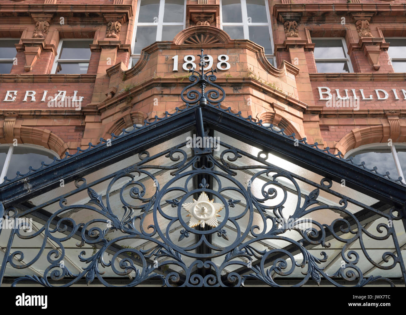 Detail of imperial buildings cast iron gabled canopy Stock Photo - Alamy