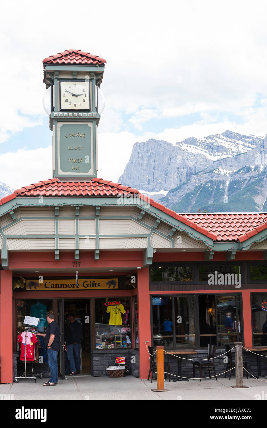 The Clock Tower over The Canmore Gift Shop with The Rocky Mountains in ...