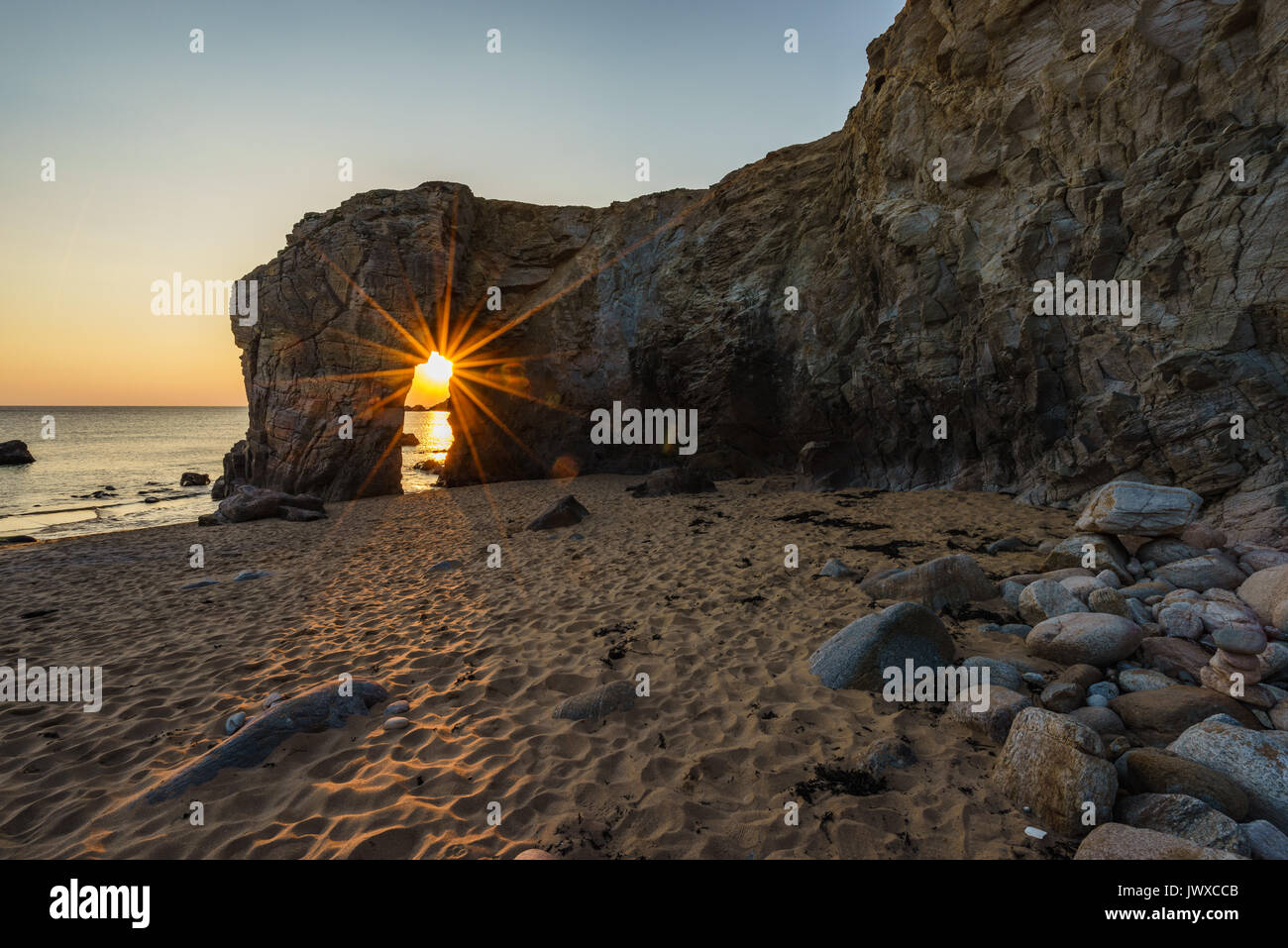 Sunset at the Arche de Port Blanc in Saint-Pierre-Quiberon in Brittany ...