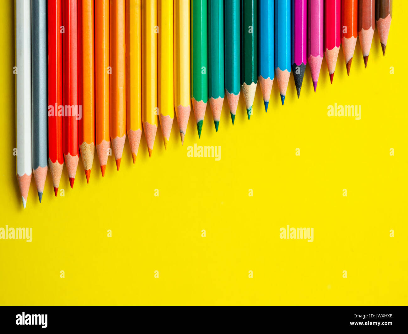 Colored pencil rainbow wave art school education Stock Photo - Alamy