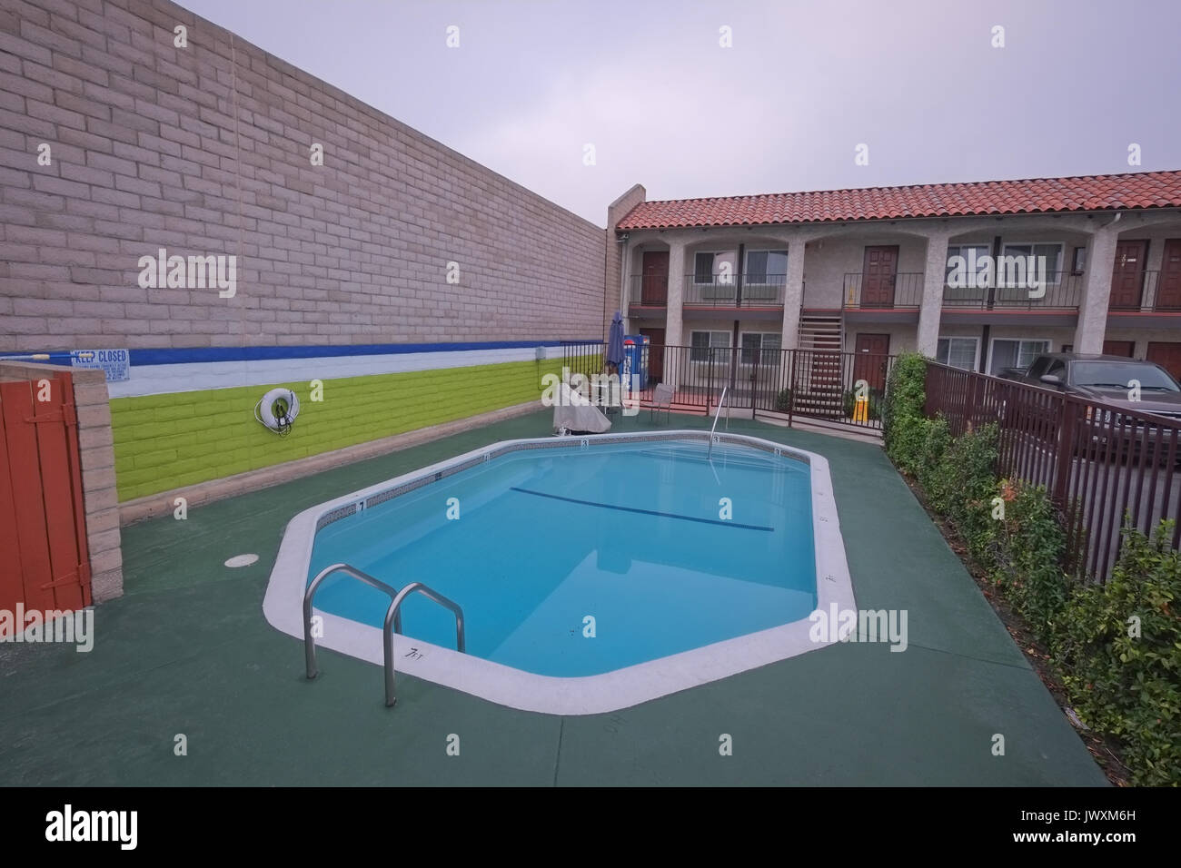 Gray Skies, Empty Motel Pool Stock Photo - Alamy