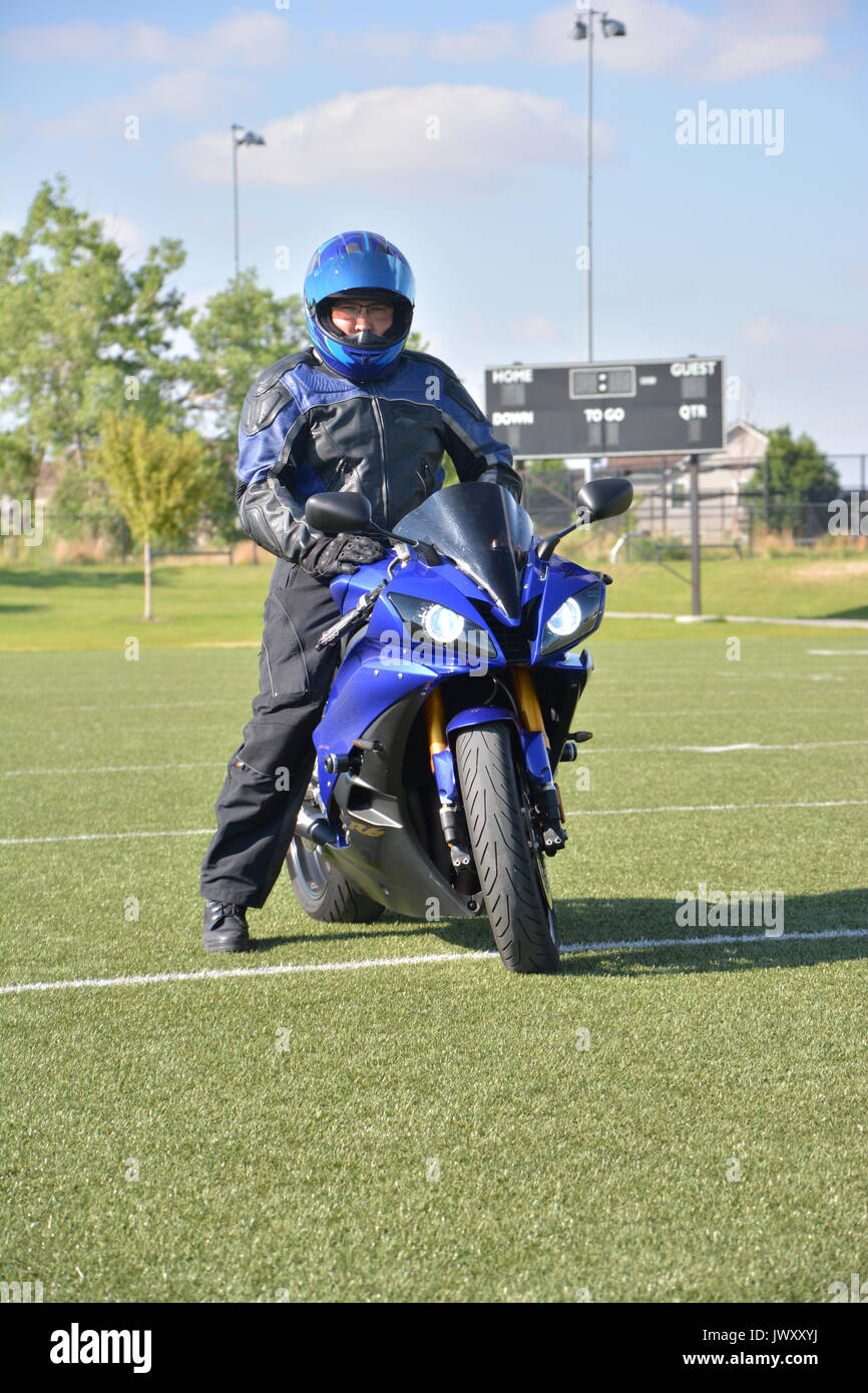 Rider On The Football Field Stock Photo - Alamy