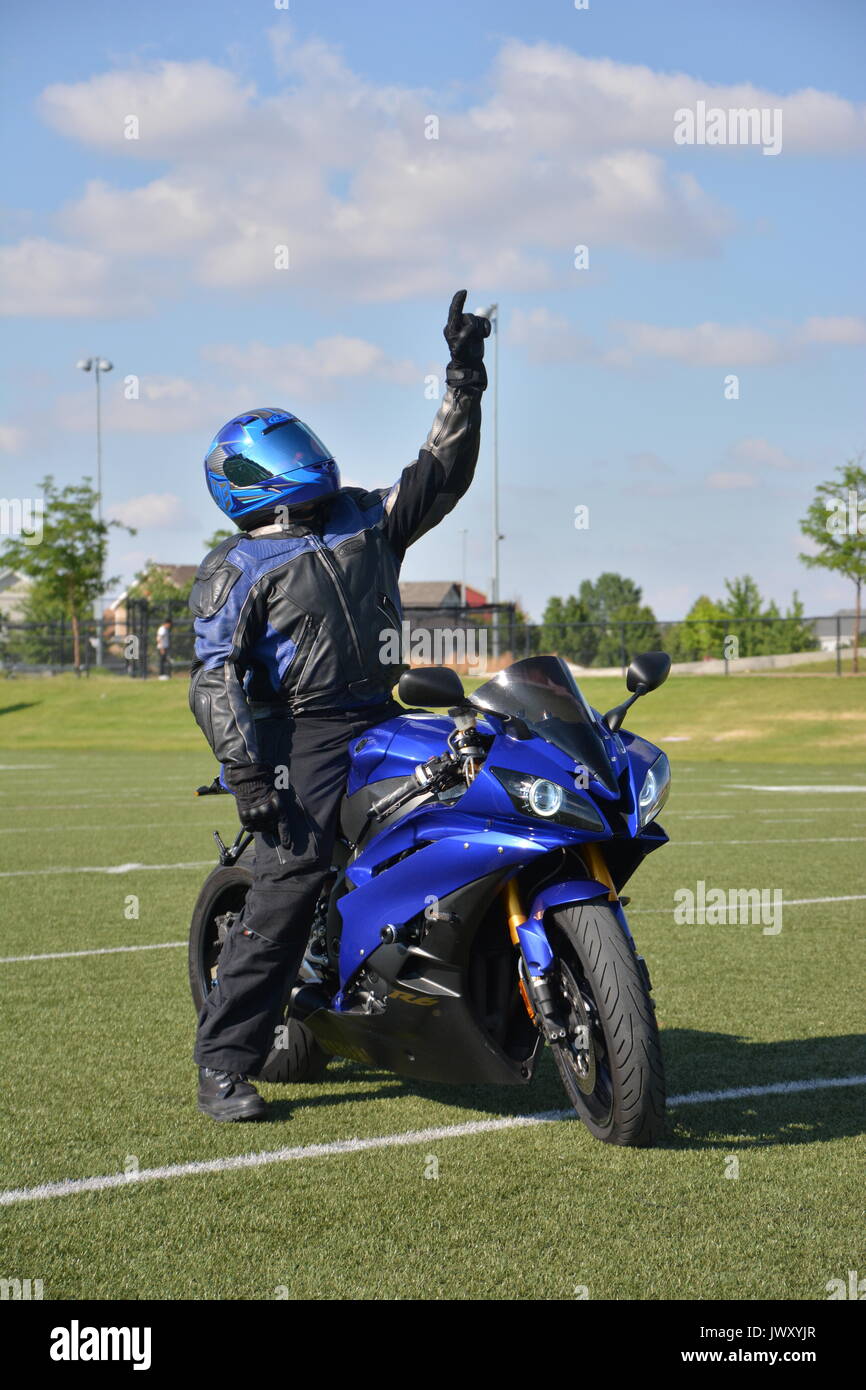Man on motorbike field hi-res stock photography and images - Alamy