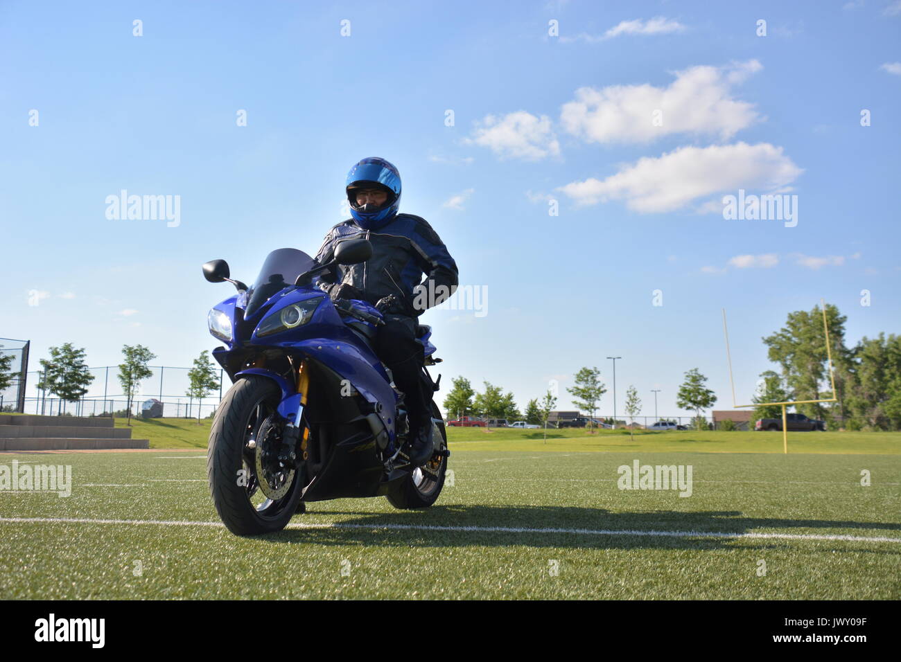 Rider On The Football Field Stock Photo - Alamy
