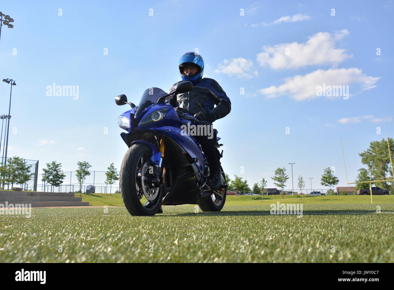 Biker with green jacket hi-res stock photography and images - Alamy