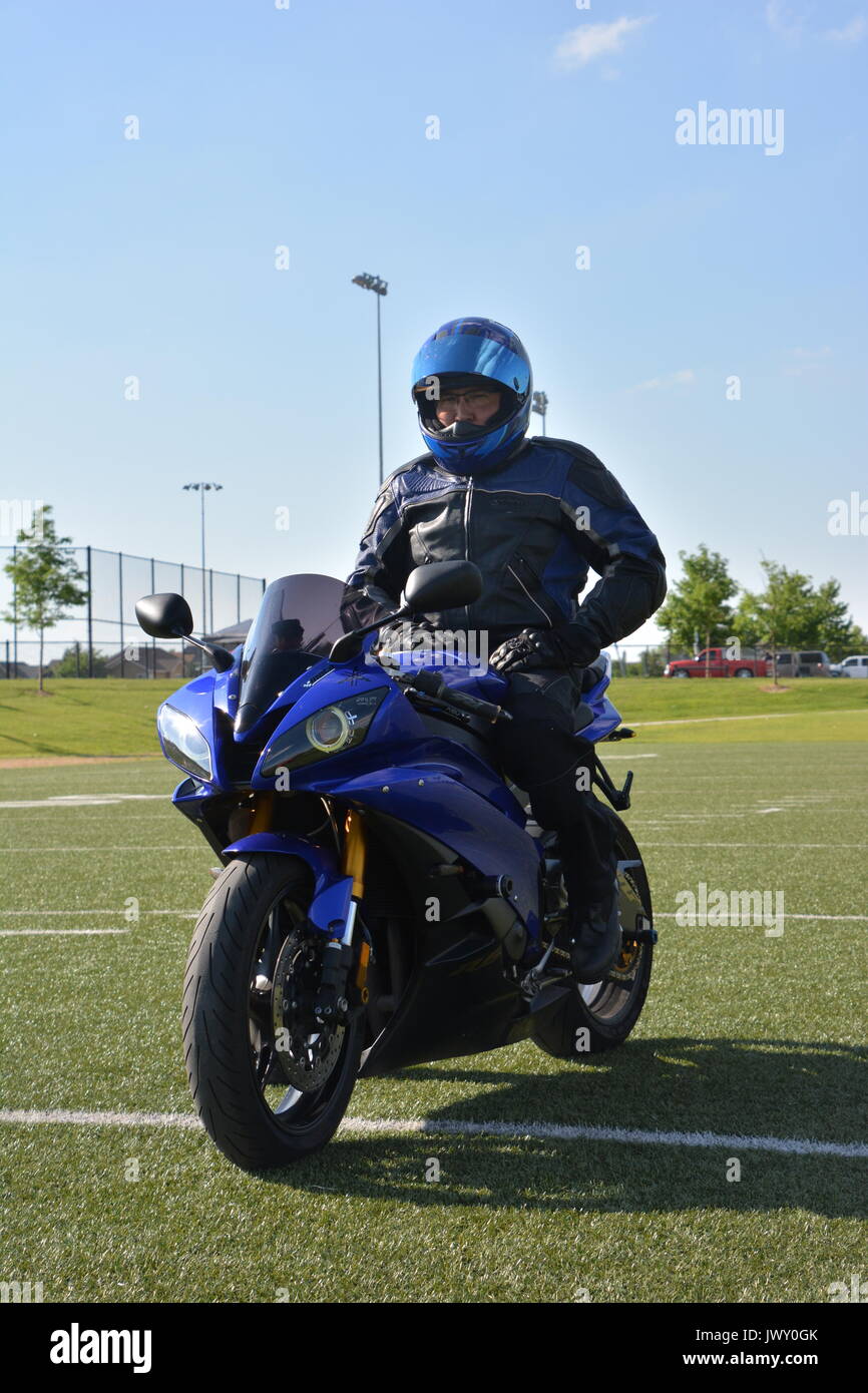 Rider On The Football Field Stock Photo - Alamy