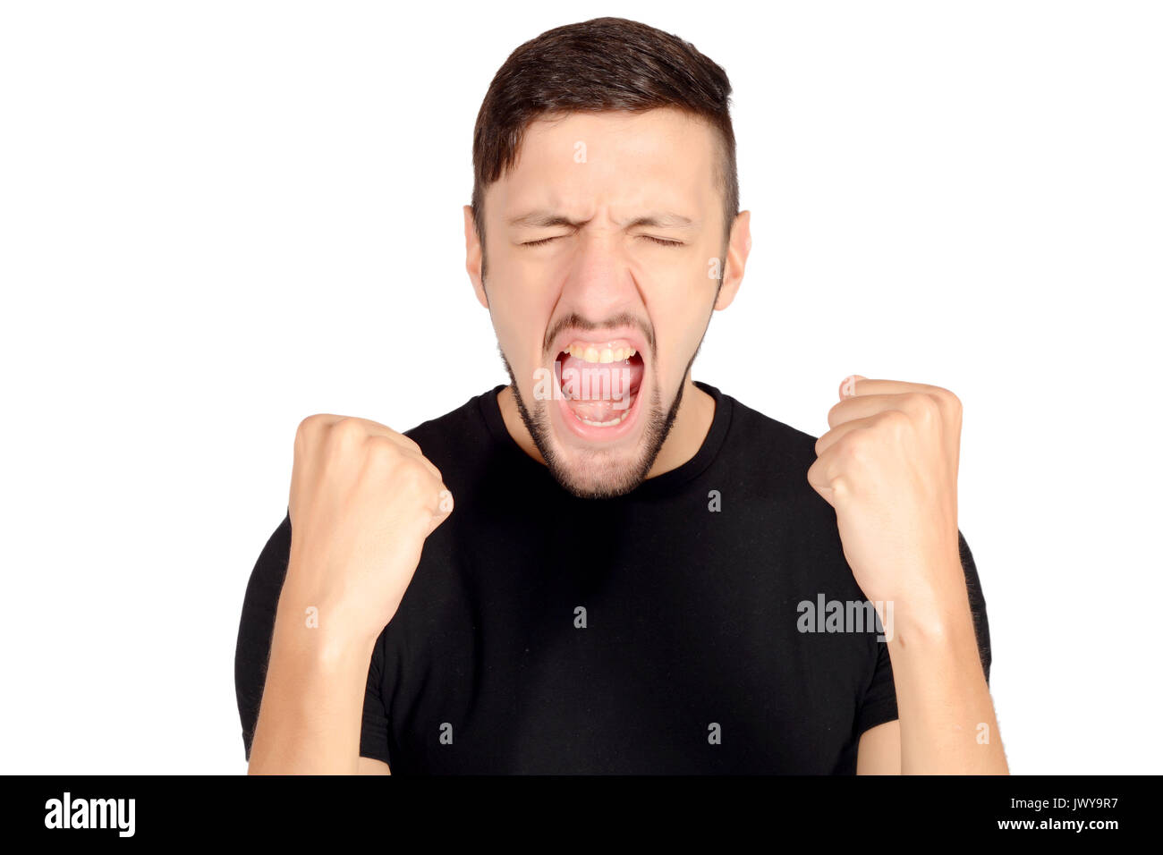 Portrait of a young latin man celebration victory. Isolated white ...