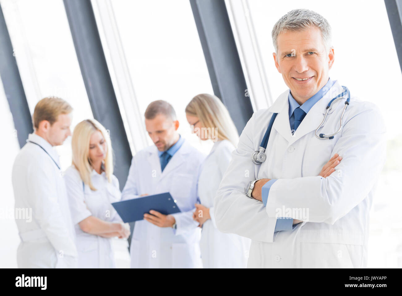 Happy team doctor meeting hi-res stock photography and images - Alamy