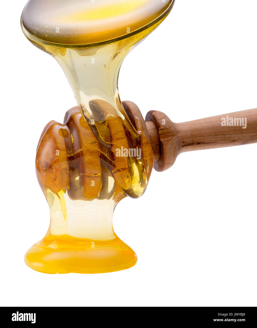 dropping honey isolated on a white background Stock Photo - Alamy