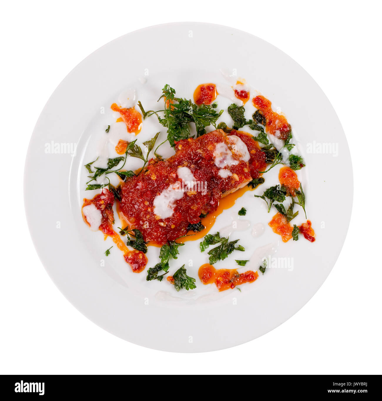 fish under tomato-pepper sauce Stock Photo - Alamy