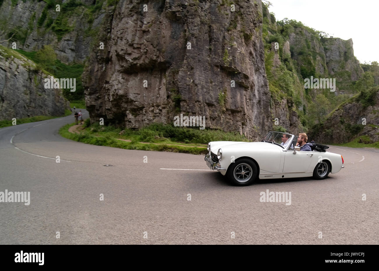 13th August 2017 - White MG Midget restored classic car climbing ...