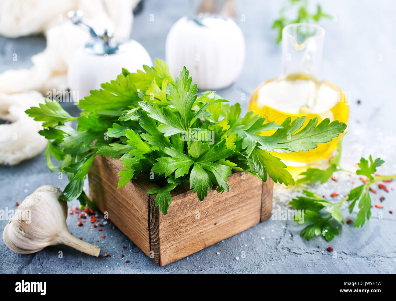 fresh parsley in wooden box and on a table Stock Photo - Alamy