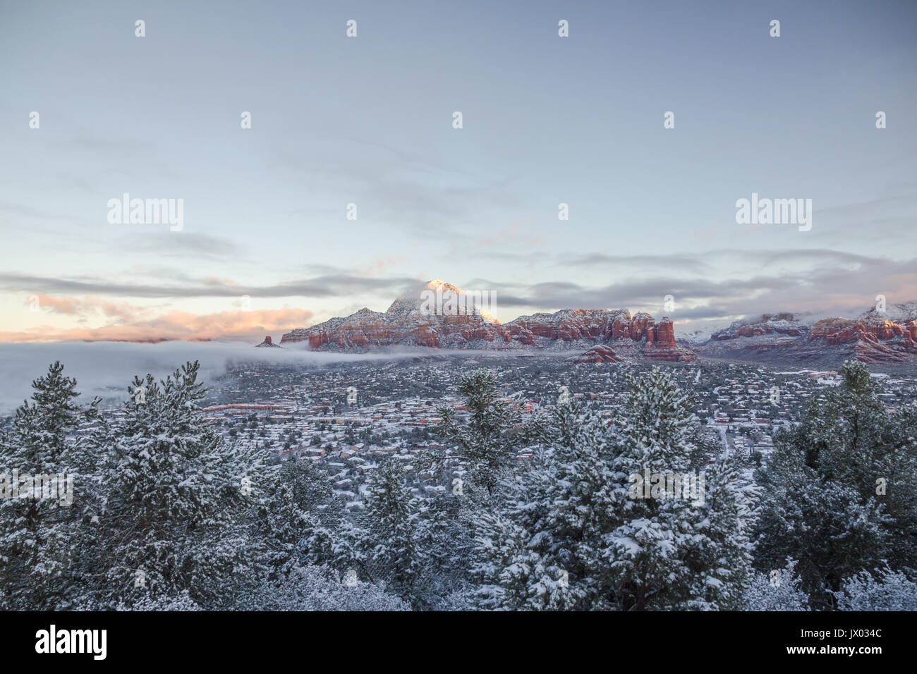 Looking north across snow-covered Sedona towards Thunder Mountain ...