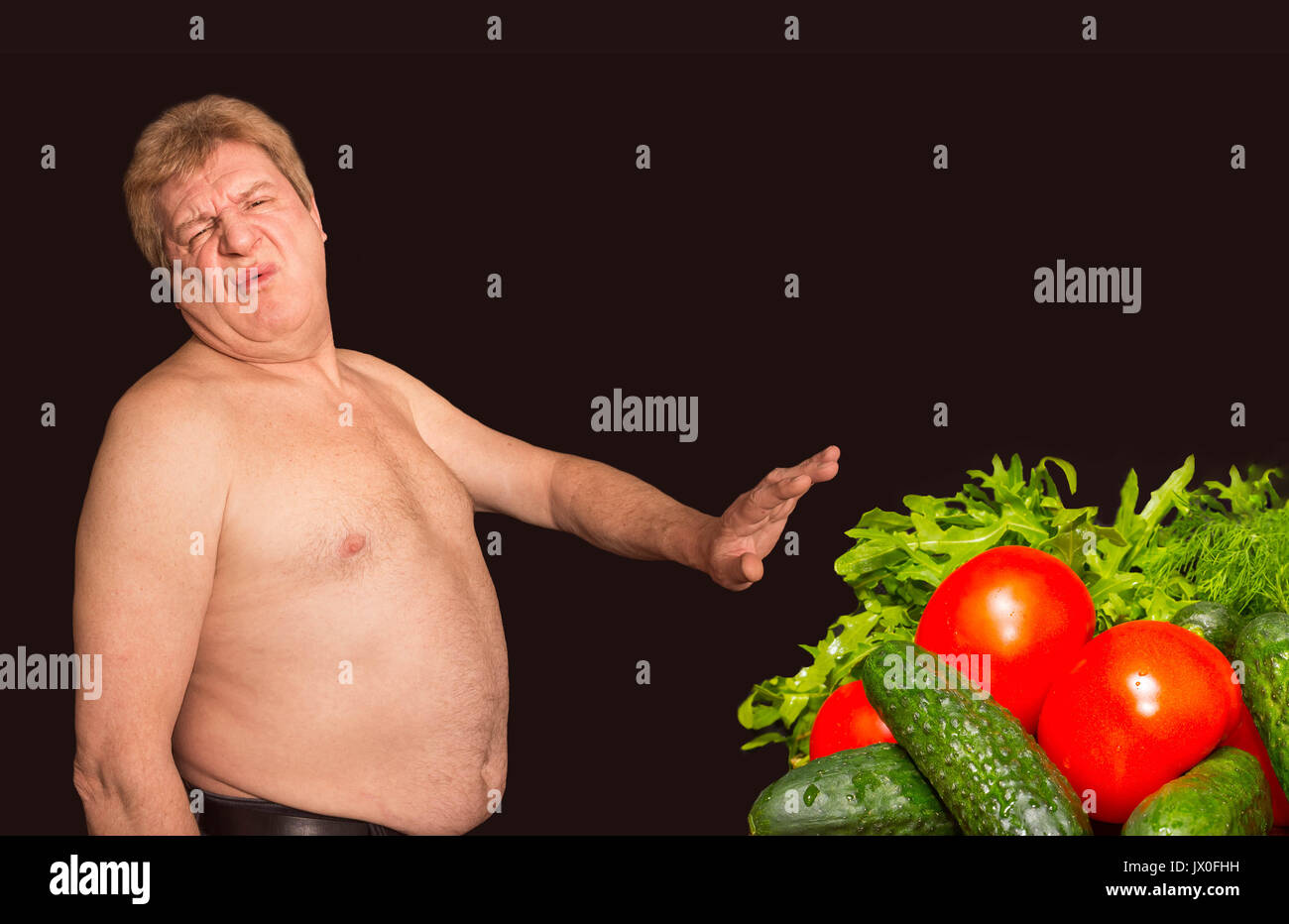 The diet concept - overweight and fat man denying healthy food Stock ...