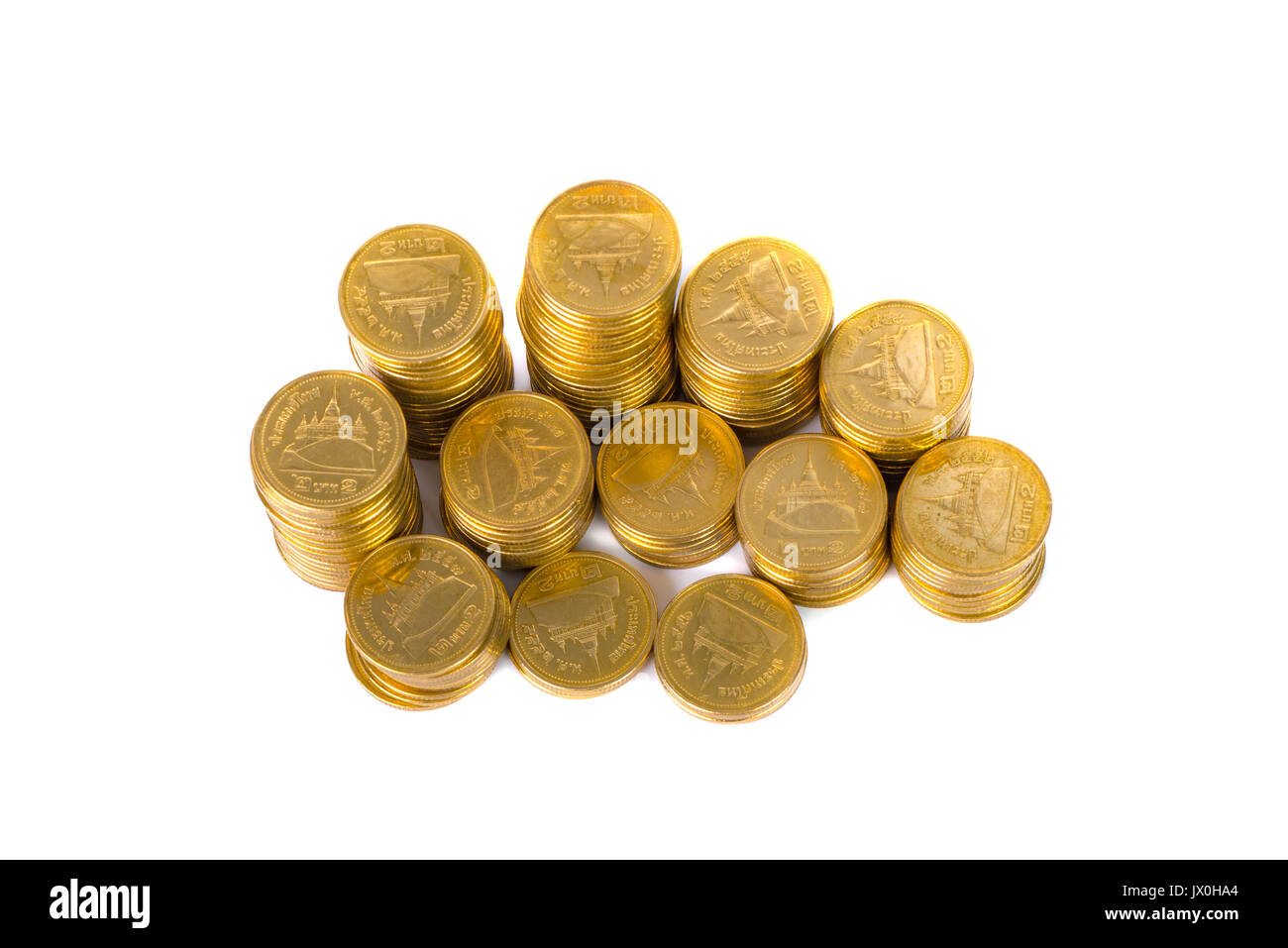 Columns of gold coins, piles of coins arranged on white background ...